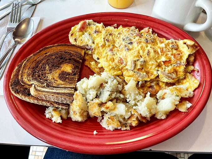 Not all heroes wear capes—some come on red plates with perfectly crisped home fries and marbled rye toast.