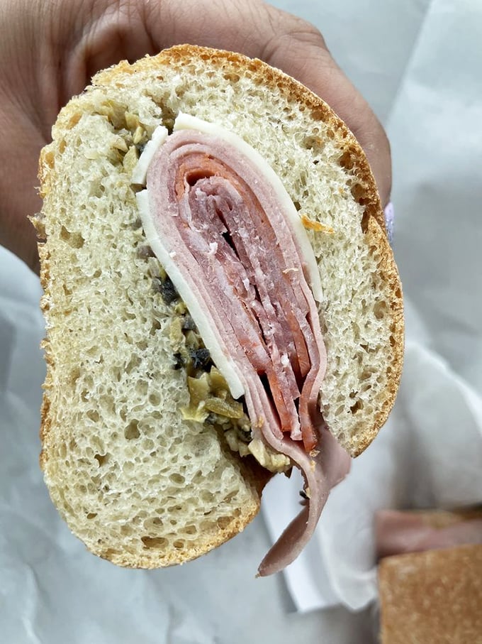 Layer upon layer of thinly sliced meats and cheese&mdash;this isn't just a sandwich, it's edible architecture with a side of history.