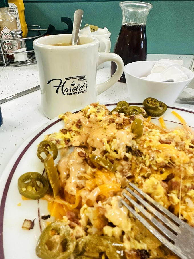 Not all heroes wear capes—some wear melted cheese. This loaded breakfast scramble answers the eternal question: "Why can't breakfast have everything?"