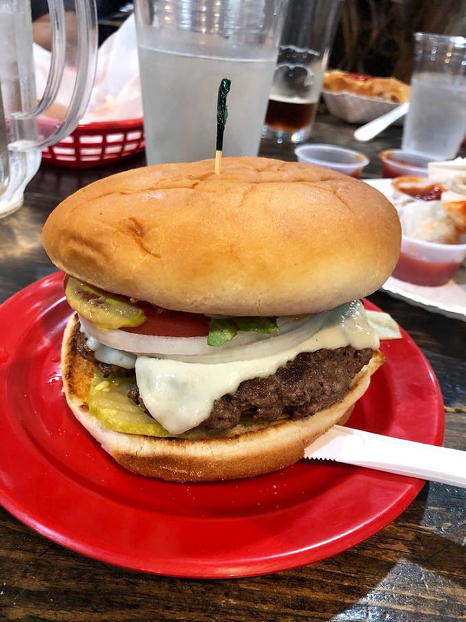 Not just a burger, but a statement piece. If Michelangelo sculpted beef, cheese, and fresh veggies, this would be his David.