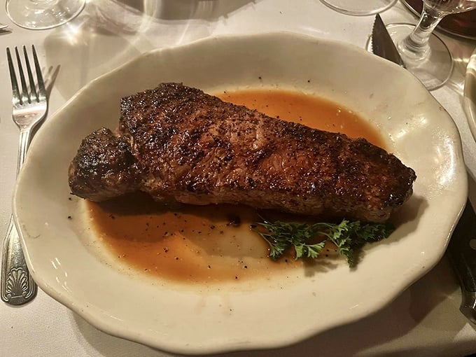 This New York Strip isn't just cooked—it's been granted a perfect sear in what must be the afterlife for exceptional beef.