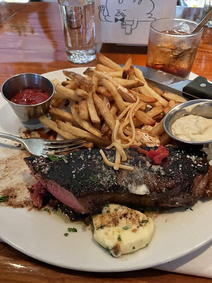 The legendary New York Strip arrives with a crust that should have its own fan club. Carnivore nirvana achieved.