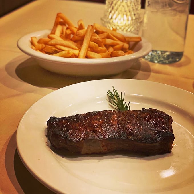 Simplicity at its most delicious &ndash; a perfectly charred New York strip with golden fries. No foam, no tweezers, just honest-to-goodness flavor.