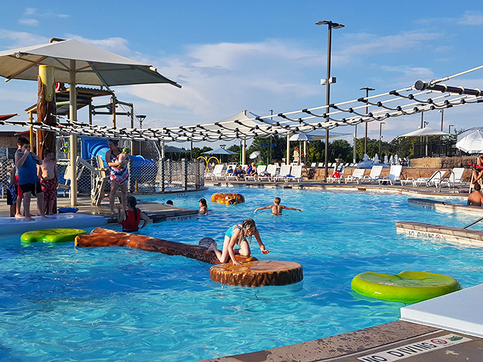 Floating lily pads that separate the "I think I can" kids from the "watch this" daredevils. The ultimate test of balance, courage, and public embarrassment.