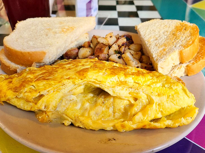 This omelet doesn't just whisper "good morning"&mdash;it belts it out like a gospel choir. Perfectly executed with crispy potatoes and toast.