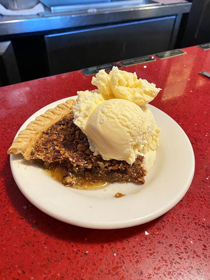 Pecan pie that makes time stand still&mdash;warm, gooey center with perfectly toasted nuts and a scoop of vanilla ice cream melting into every crevice.