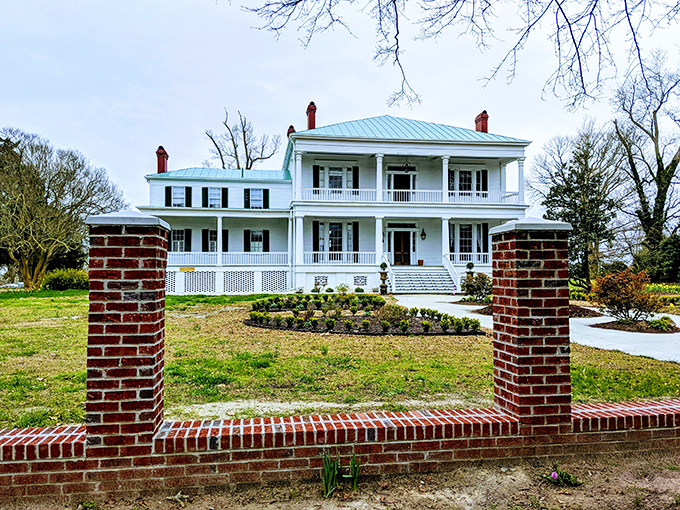 Pembroke Hall's grand white facade and graceful porches make Southern hospitality look like architectural poetry in motion.