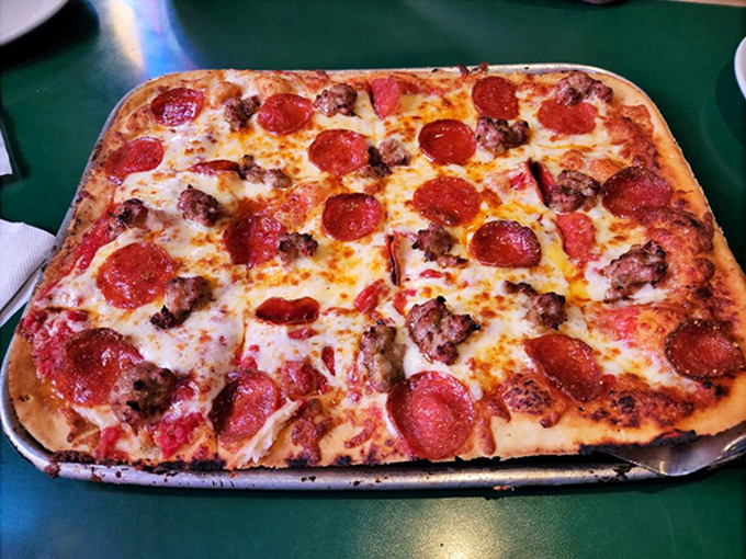 The pepperoni and sausage pizza that launched a thousand diet cheat days. That cheese pull should have its own Instagram account.