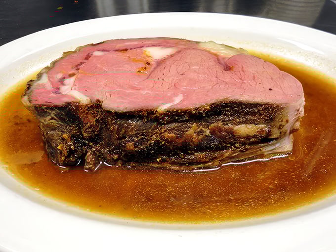 Behold the star of the show: prime rib so perfectly pink it should have its own Instagram account, swimming in an au jus that's liquid gold.