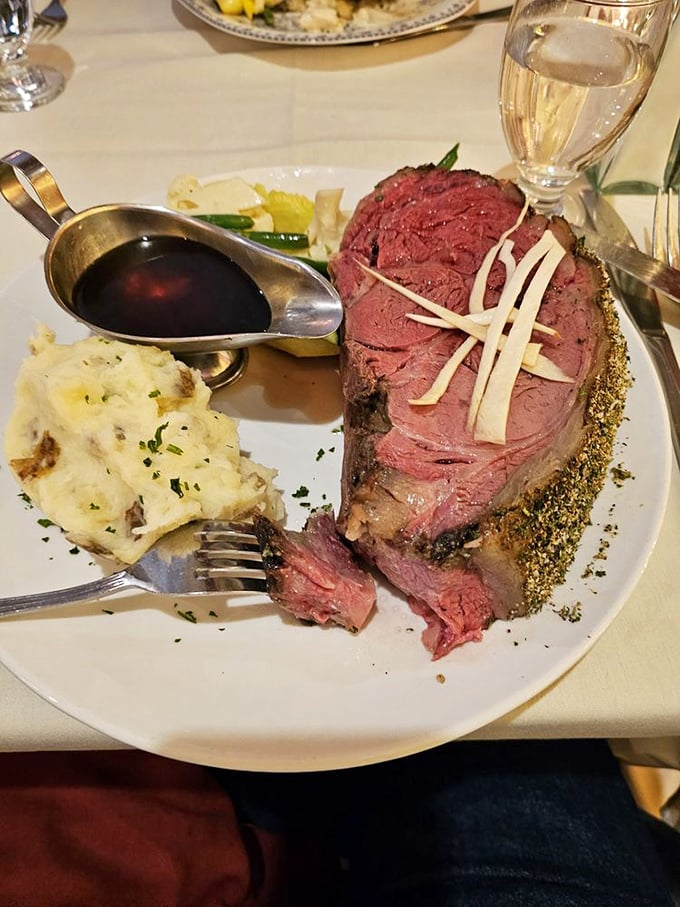 This isn't just prime rib &ndash; it's edible artwork. The perfect pink center, seasoned crust, and silky au jus create a trio of flavors that would make founding fathers weep.