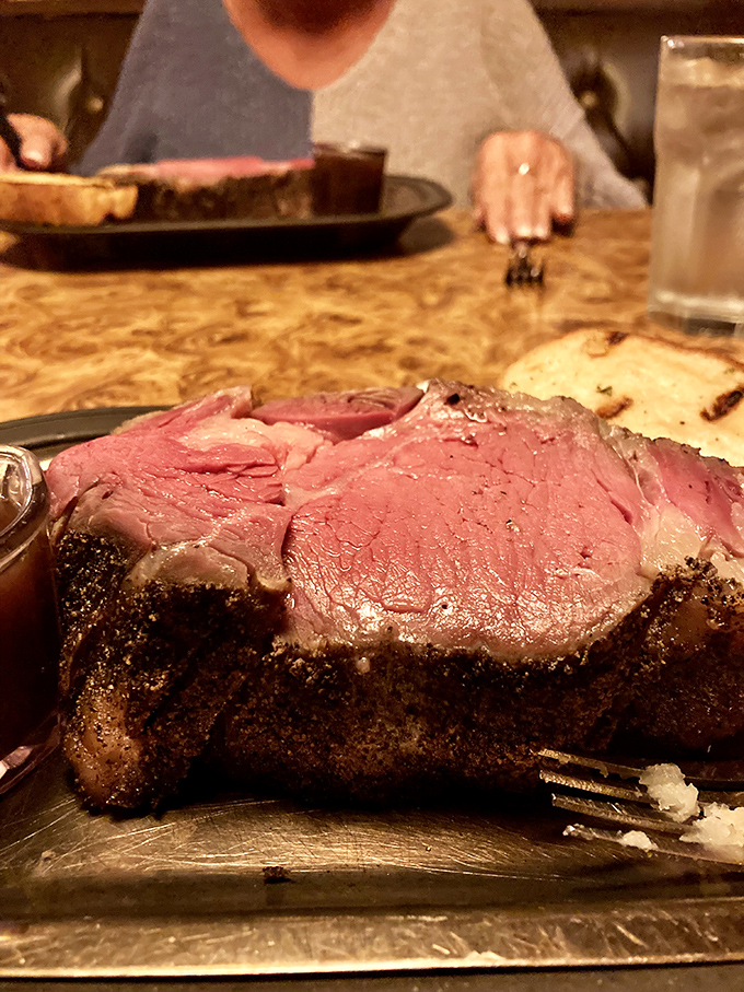 This isn't just prime rib; it's edible poetry with a perfectly pink center and seasoned crust that could make a vegetarian question their life choices.