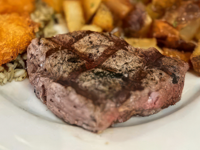 This isn't just prime rib; it's a monument to meat, a testimony to what happens when beef is treated with the reverence it deserves.