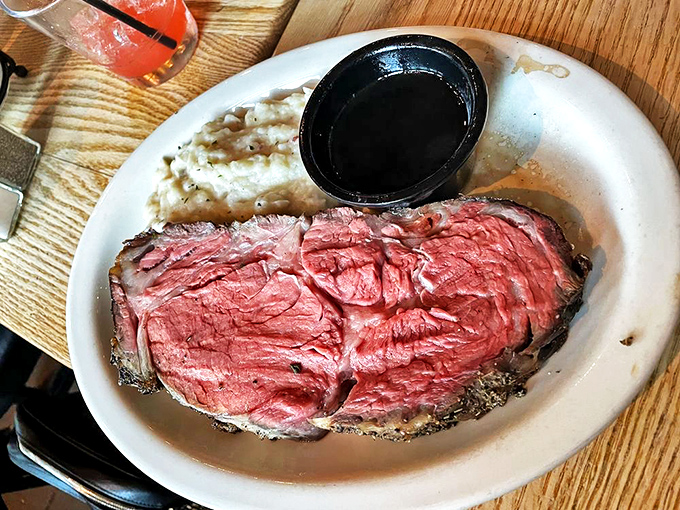 The prime rib in all its glory&mdash;pink, juicy, and perfect. This isn't just dinner; it's the reason some people extend their vacations.