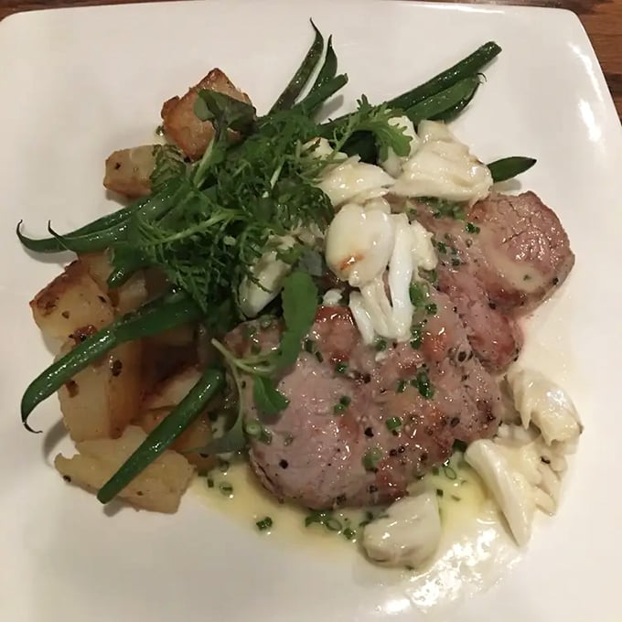 This isn't just prime rib&mdash;it's a masterclass in meat, perfectly pink and paired with crisp green beans and roasted potatoes.