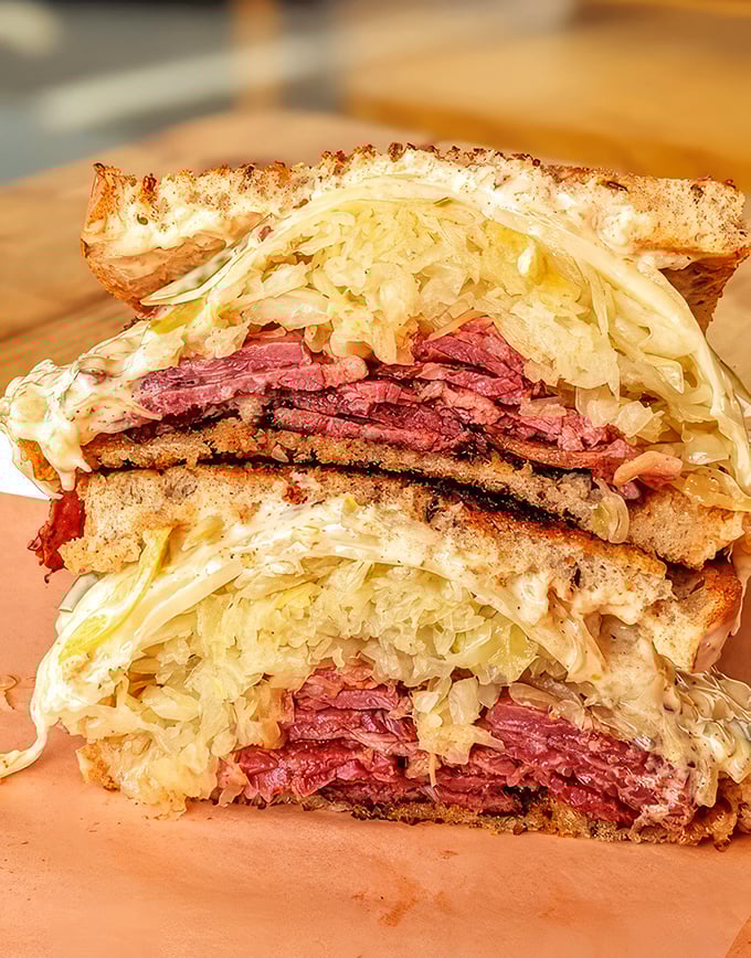 Architecture, chemistry, and magic all stacked between rye bread. This towering Reuben isn't just a sandwich&mdash;it's a life-affirming experience.