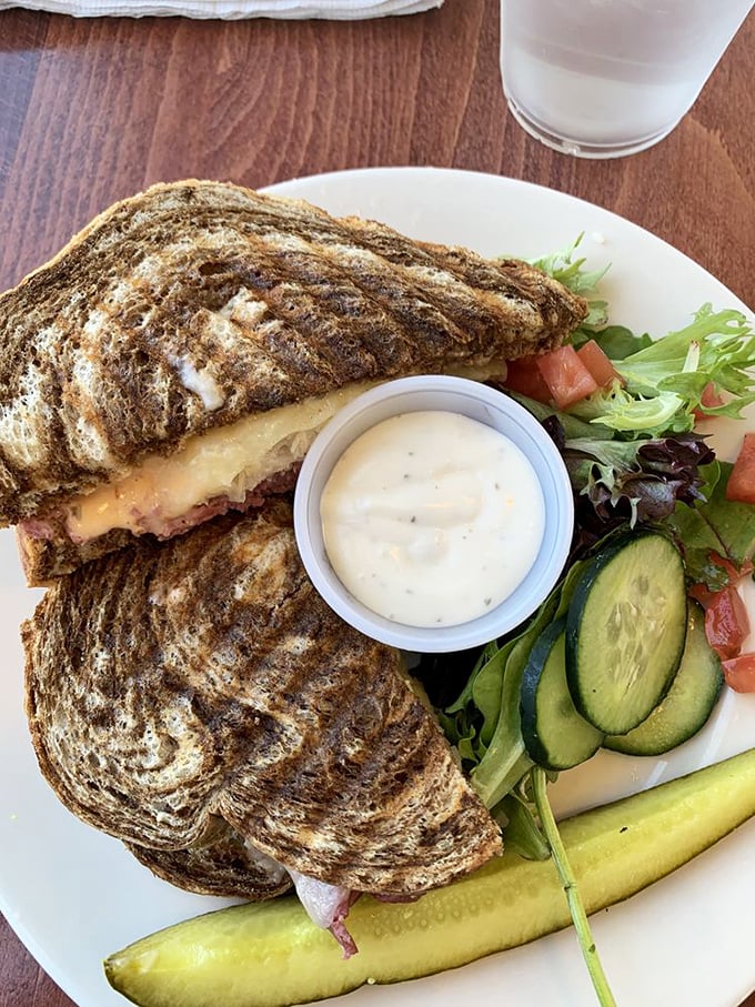 The sandwich that launched a thousand road trips. Perfectly grilled rye, melty cheese, and that side of house dressing that you'll be tempted to drink straight from the cup.