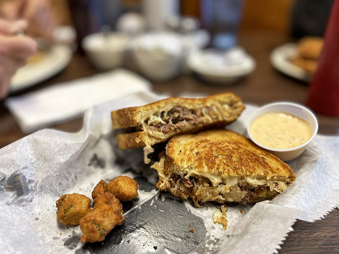 The legendary Reuben in all its glory&mdash;where perfectly grilled rye bread barely contains the mountain of corned beef, sauerkraut, and Swiss that's worth every napkin you'll need.