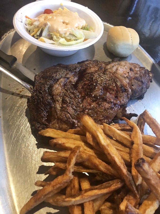 Ribeye steak platter: Behold the showstopper&mdash;a perfectly seared ribeye that makes fancy city steakhouses seem like overpriced pretenders. Worth every penny and calorie.