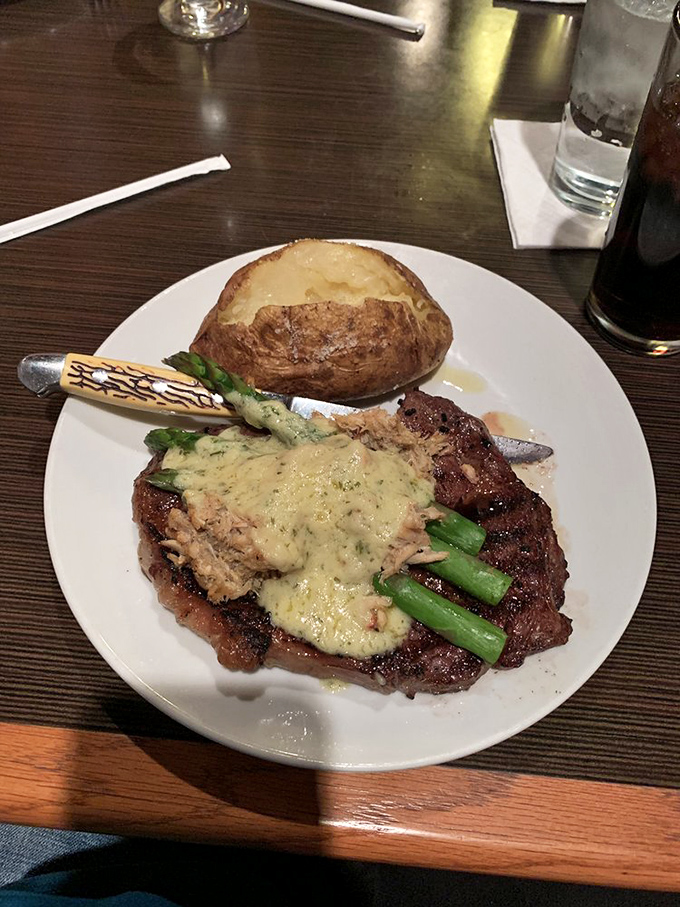 This isn't just steak&mdash;it's a masterpiece topped with crab and asparagus. Surf and turf harmony on a plate.