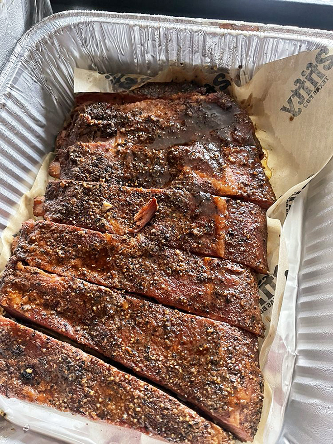 These ribs aren't just cooked&mdash;they're coaxed into perfection. That bark is the barbecue equivalent of a Prada handbag: expensive-looking and worth every penny.