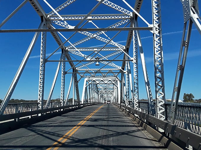 The Roy Inks Bridge isn't just functional infrastructure—it's a steel sentinel connecting both sides of town across the Llano River with industrial elegance.