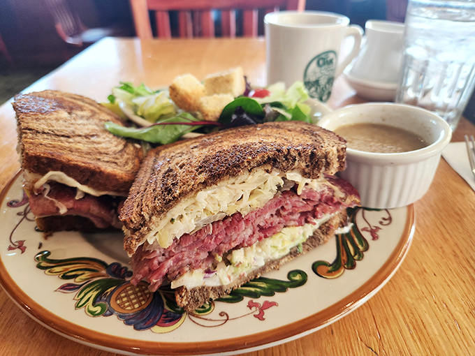 This isn't just a sandwich; it's a skyscraper of flavor with layers of corned beef, sauerkraut, and melty cheese that demands architectural appreciation.