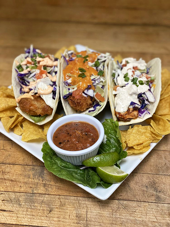 These seafood tacos are dressed to impress—crispy fish nestled in soft shells with vibrant slaw and sauces that'll make you forget you're 500 miles from the ocean.
