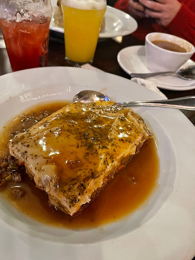 This shepherd's pie isn't just dinner – it's edible therapy, with golden mashed potatoes floating atop a savory sea of lamb and vegetables.