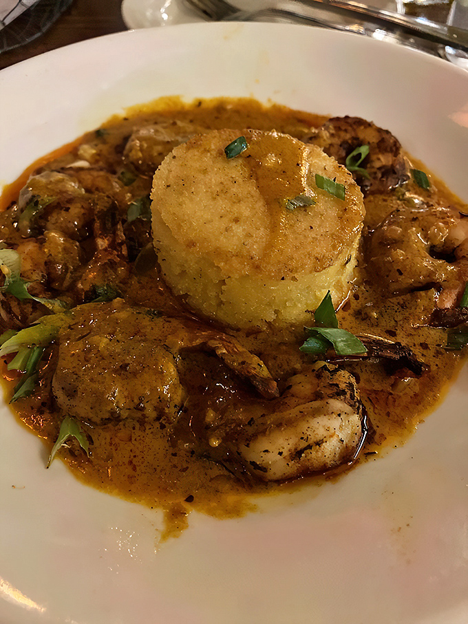 This isn't just shrimp and grits&mdash;it's a Southern hug on a plate. That crispy grit cake standing tall like a fortress protecting delectable shrimp treasures.