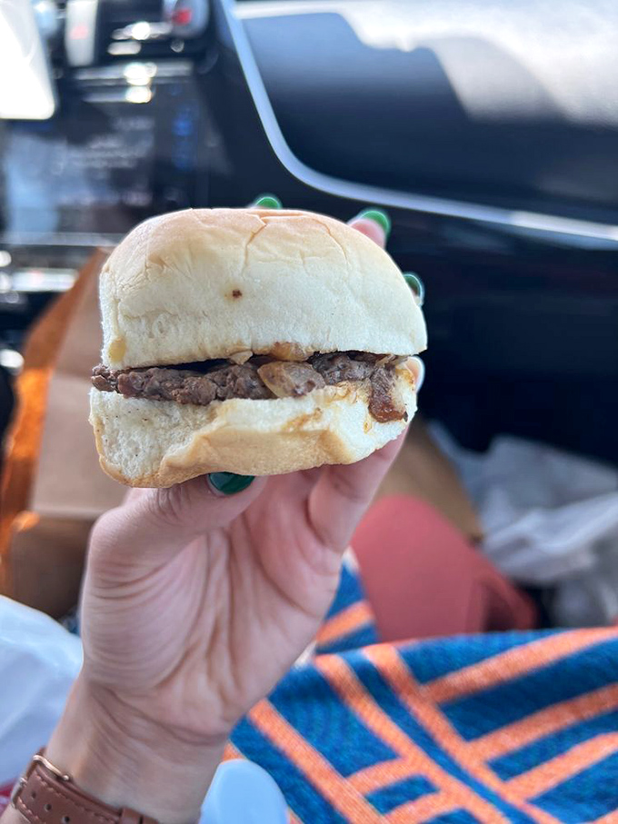 The star of the show in all its glory. This palm-sized wonder packs more flavor than burgers triple its size.