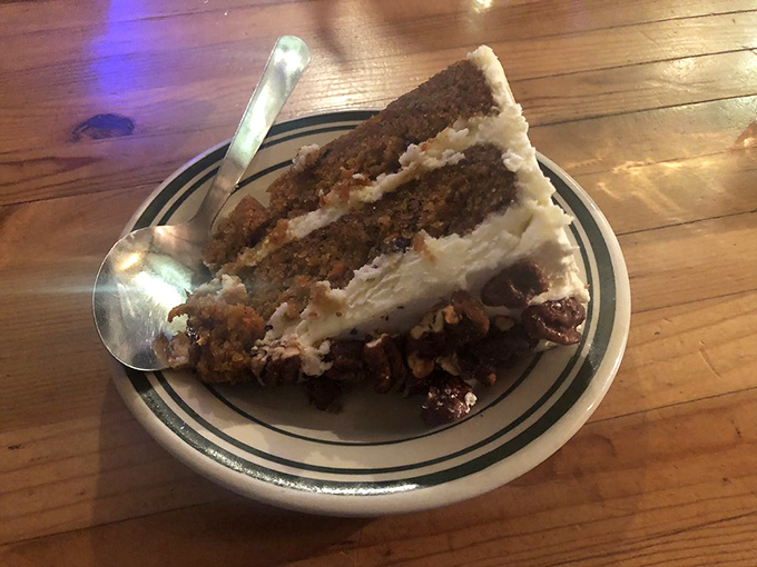 Behold the holy grail of carrot cake! Three perfect layers of spiced perfection with cream cheese frosting that would make angels weep.