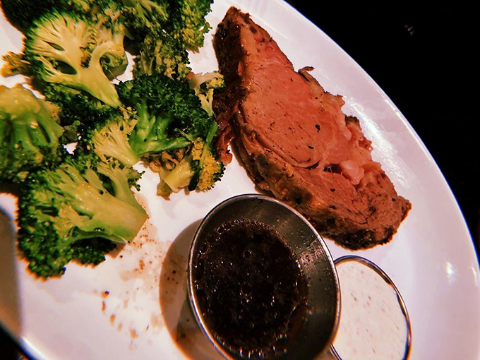 That prime rib isn't just cooked—it's been on a spiritual journey. The pink center whispers promises that make vegetarians reconsider their life choices.