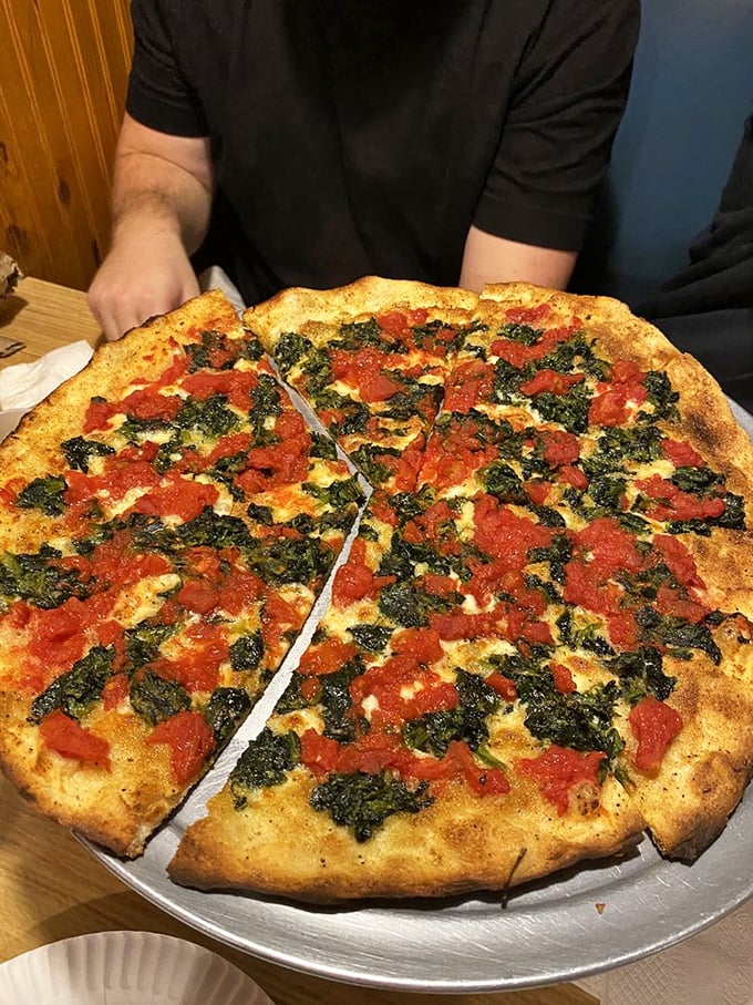 This pepperoni pie isn't just a topping arrangement&mdash;it's a geometry lesson in perfect distribution. Each slice promises the ideal meat-to-cheese ratio. 