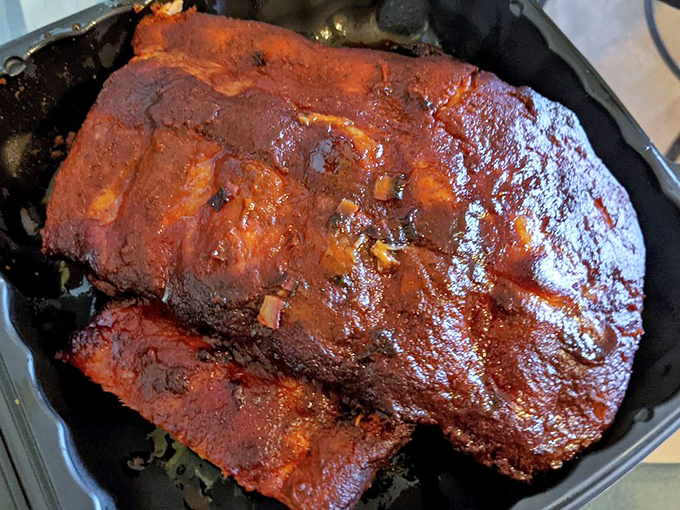 These St. Louis ribs aren't falling off the bone&mdash;that would be overcooked. Instead, they offer that perfect, tender resistance that BBQ aficionados dream about.