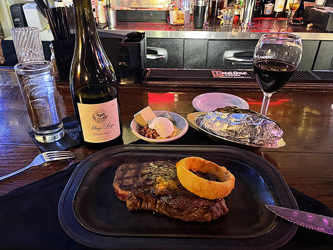 Feast your eyes on beef perfection paired with an onion ring crown. This plate doesn't need Instagram filters&mdash;it's the real deal that makes your phone seem suddenly irrelevant.