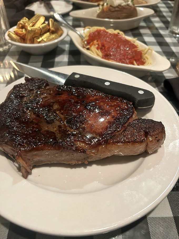 Behold the star of the show &ndash; a perfectly charred steak with that distinctive crosshatch that whispers, "I've been cooking this way since your grandparents were dating."