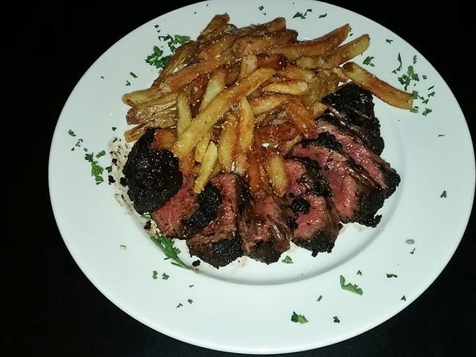 The steak arrives sliced and ready for its close-up, with fries so perfectly golden they deserve their own Instagram account.