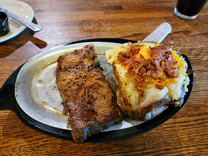 Marriage counselors should take notes: this is what a perfect union looks like&mdash;expertly seared steak beside a twice-baked potato crowned with bacon.