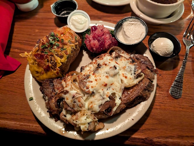 A steak adorned with melted cheese and mushrooms doesn't need to write poetry&mdash;it already speaks the universal language of deliciousness.