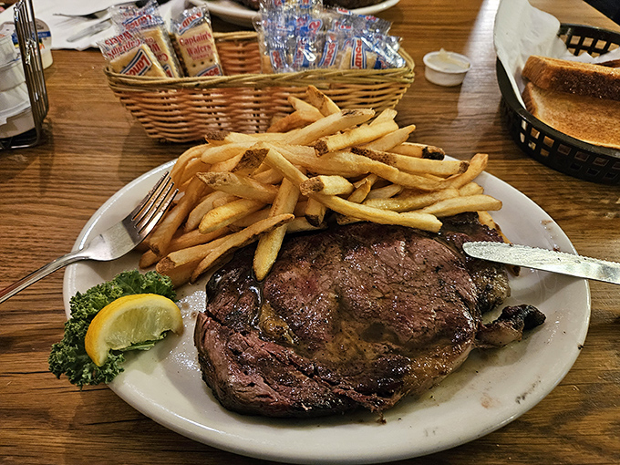 This isn't just a menu&mdash;it's a declaration of carnivorous intent. When they boldly proclaim "COOKED OVER OUR OPEN HICKORY PIT," they're not just describing a method; they're making a promise.