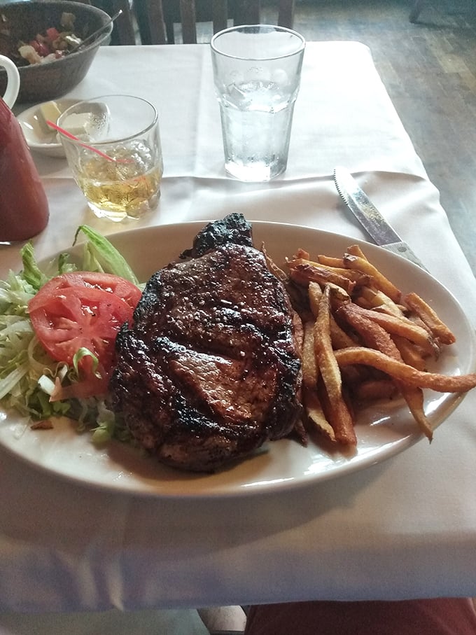 This isn't just a steak; it's a declaration of principles. The perfect char, the rosy interior, and those hand-cut fries&mdash;a holy trinity of satisfaction.