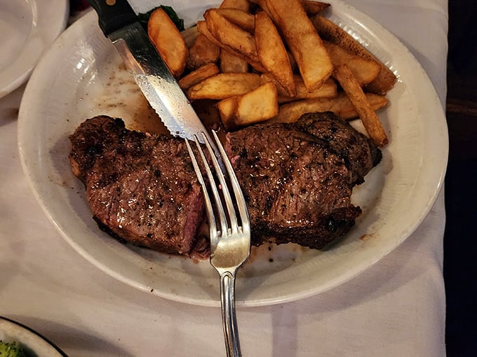 Two perfectly seared medallions with that textbook crust that makes steak lovers weak in the knees. Those hand-cut fries aren't just sides&mdash;they're co-stars.