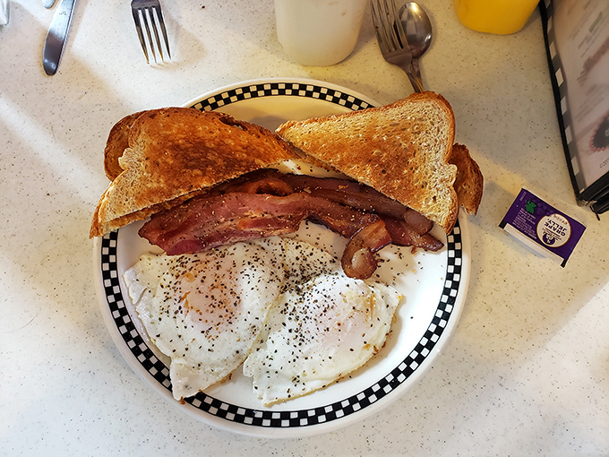 Breakfast perfection doesn't need fancy plating&mdash;just perfectly cooked eggs, crispy bacon, and toast that's achieved golden-brown nirvana.