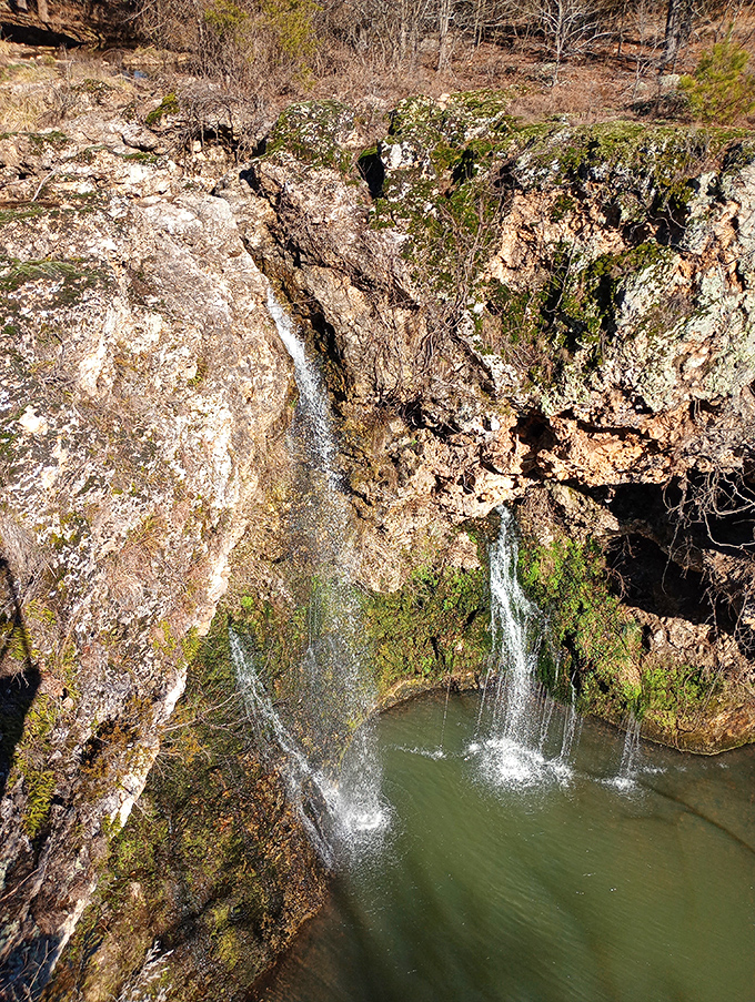 Water meets gravity in the most elegant way possible. The falls cascade like nature's champagne pour, creating a refreshing mist that cools even summer's hottest days.