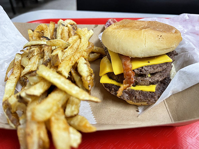 This isn't just a burger&mdash;it's a masterclass in American comfort food engineering, with those hand-cut fries playing the perfect supporting role.
