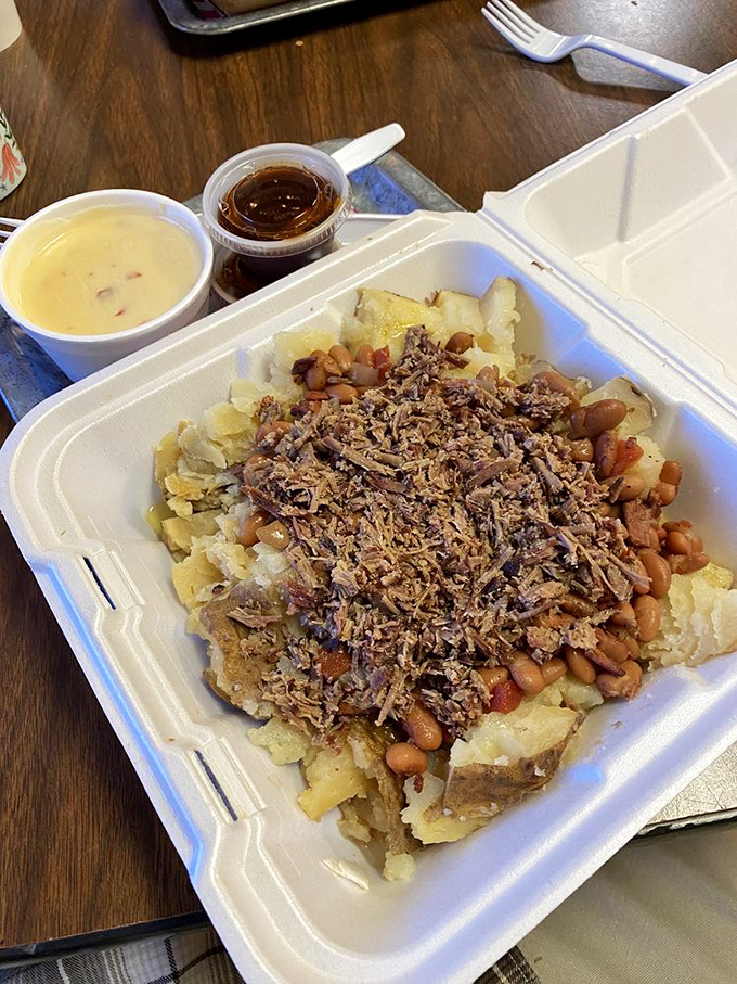 Brisket and beans nestled on a bed of potato&mdash;a holy trinity of comfort that makes you question why you'd eat anything else.