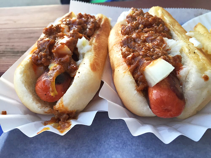 Hot dog heaven comes in pairs. These chili-smothered beauties with diced onions make you understand why people drive across county lines for lunch.