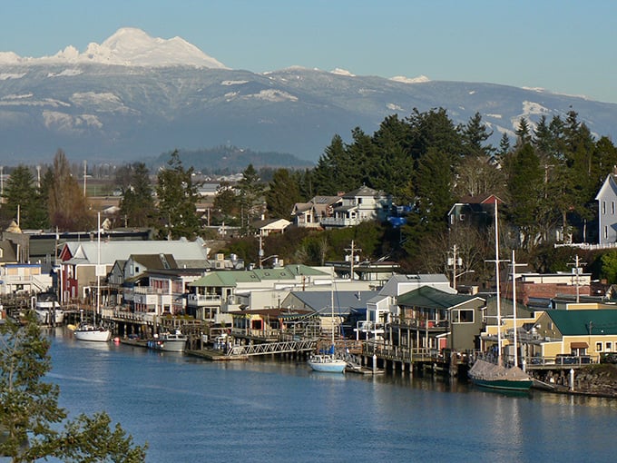 La Conner's waterfront offers a front-row seat to nature's drama, with Mount Baker playing the snow-capped leading role.