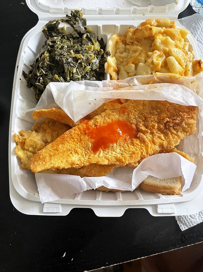 Seafood trifecta: Golden-fried whiting, soul-warming collard greens, and mac & cheese that would make your grandmother both jealous and proud.