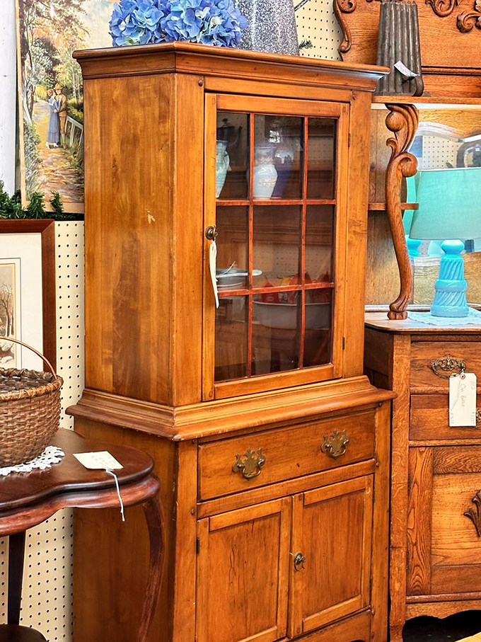 This isn't just furniture&mdash;it's a time machine. That honey-colored cabinet has probably witnessed more family dinners than your favorite sitcom.